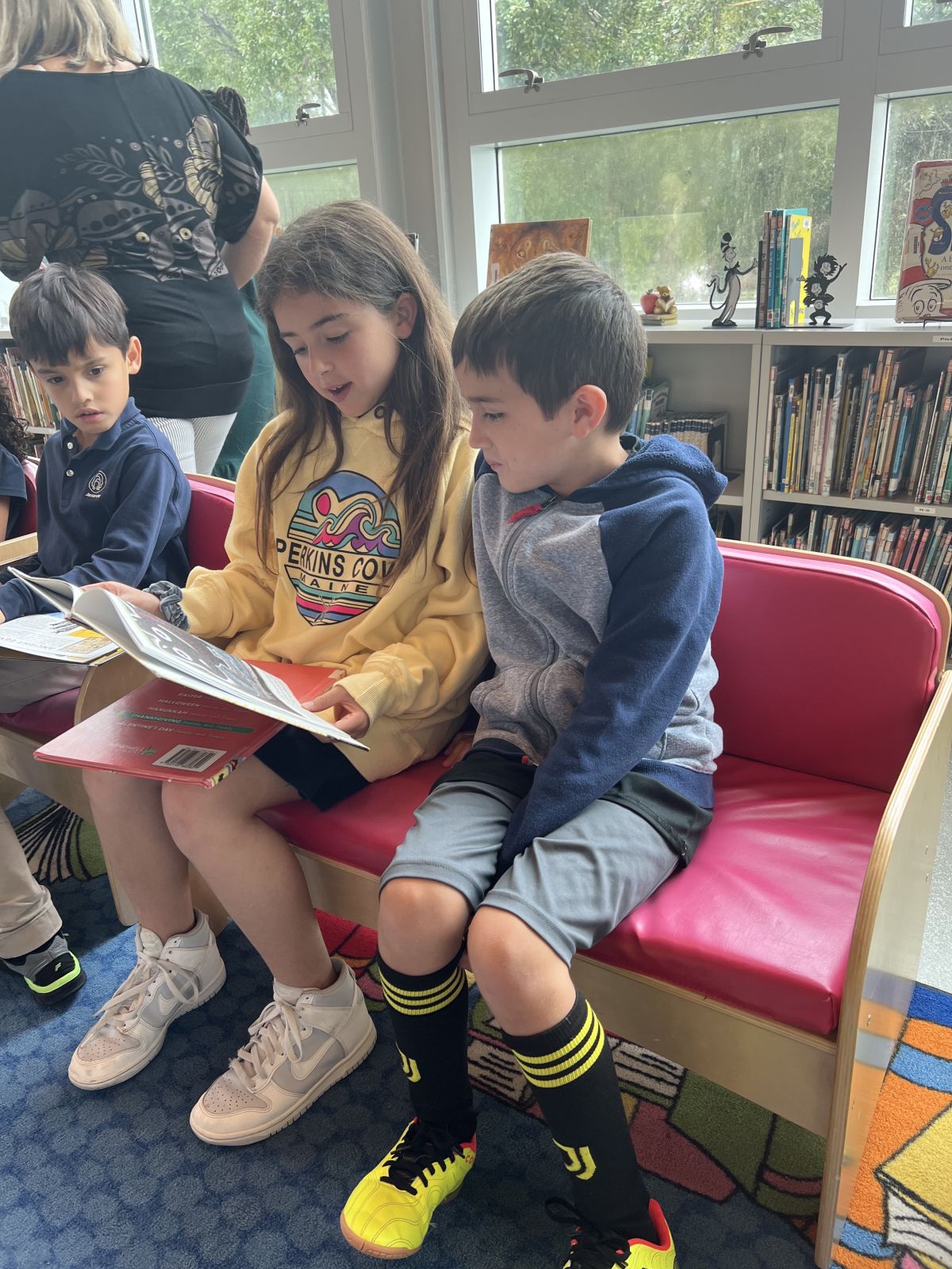 Second Graders Read To First Graders News Post Alexander Montessori