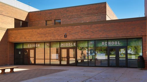 Edison Middle School Logo Cosmetic Dentist Denver | Pearl Dentistry