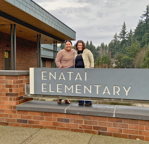 Stephanie and Amy at Enatai Elementary sign