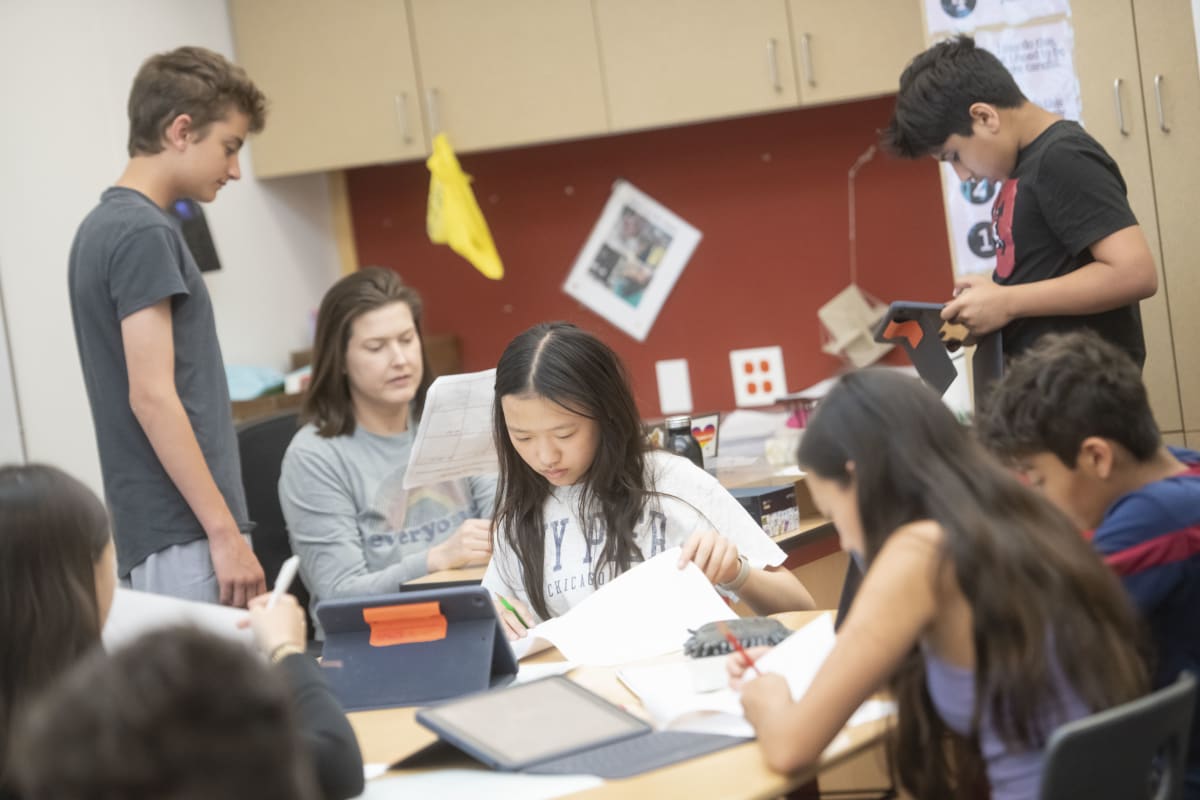 middle school students studying