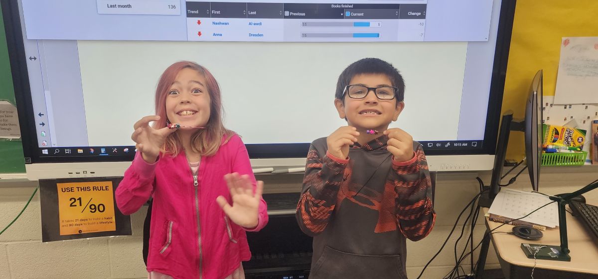 Students earn stars by reading the most books in their class in ...