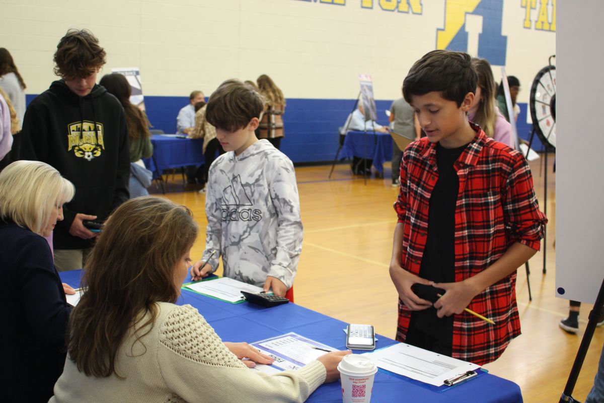New HMS 'Reality Fair' offers 8th graders lessons in financial literacy ...
