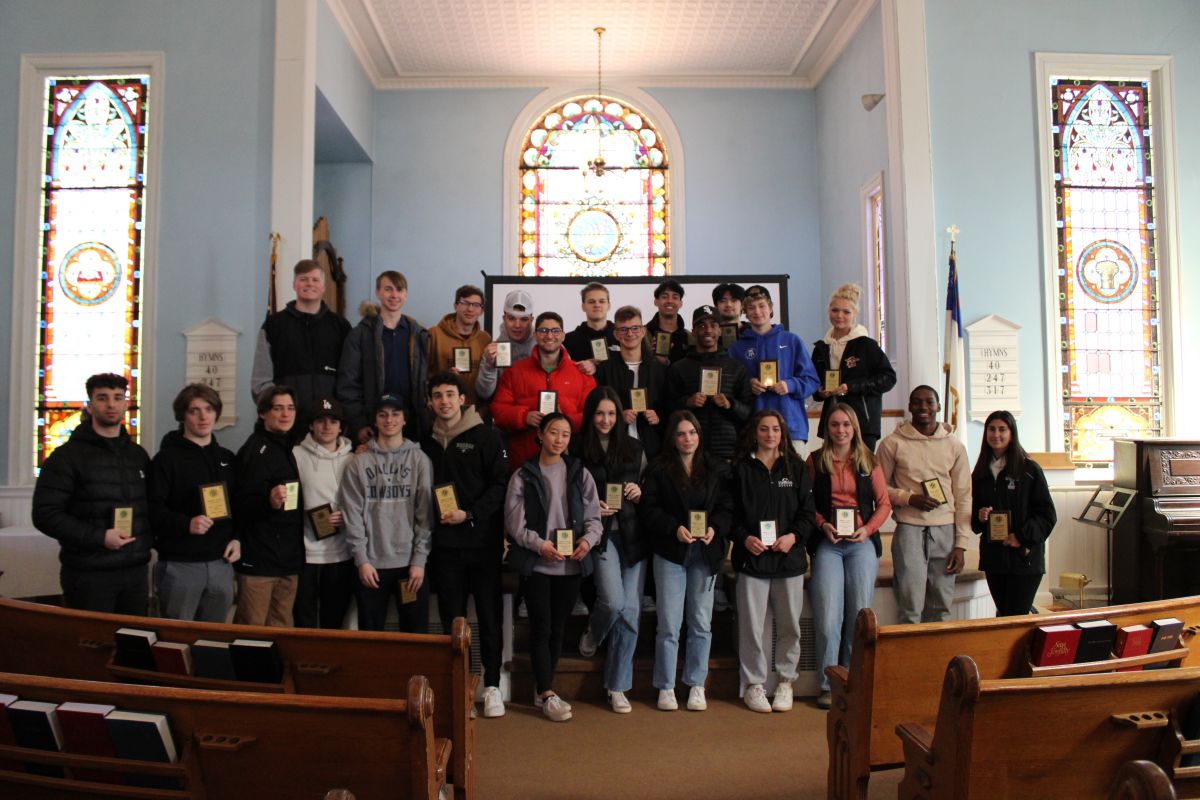 2022-23 Winter Athletic Awards | News Post with others - Hebron Academy