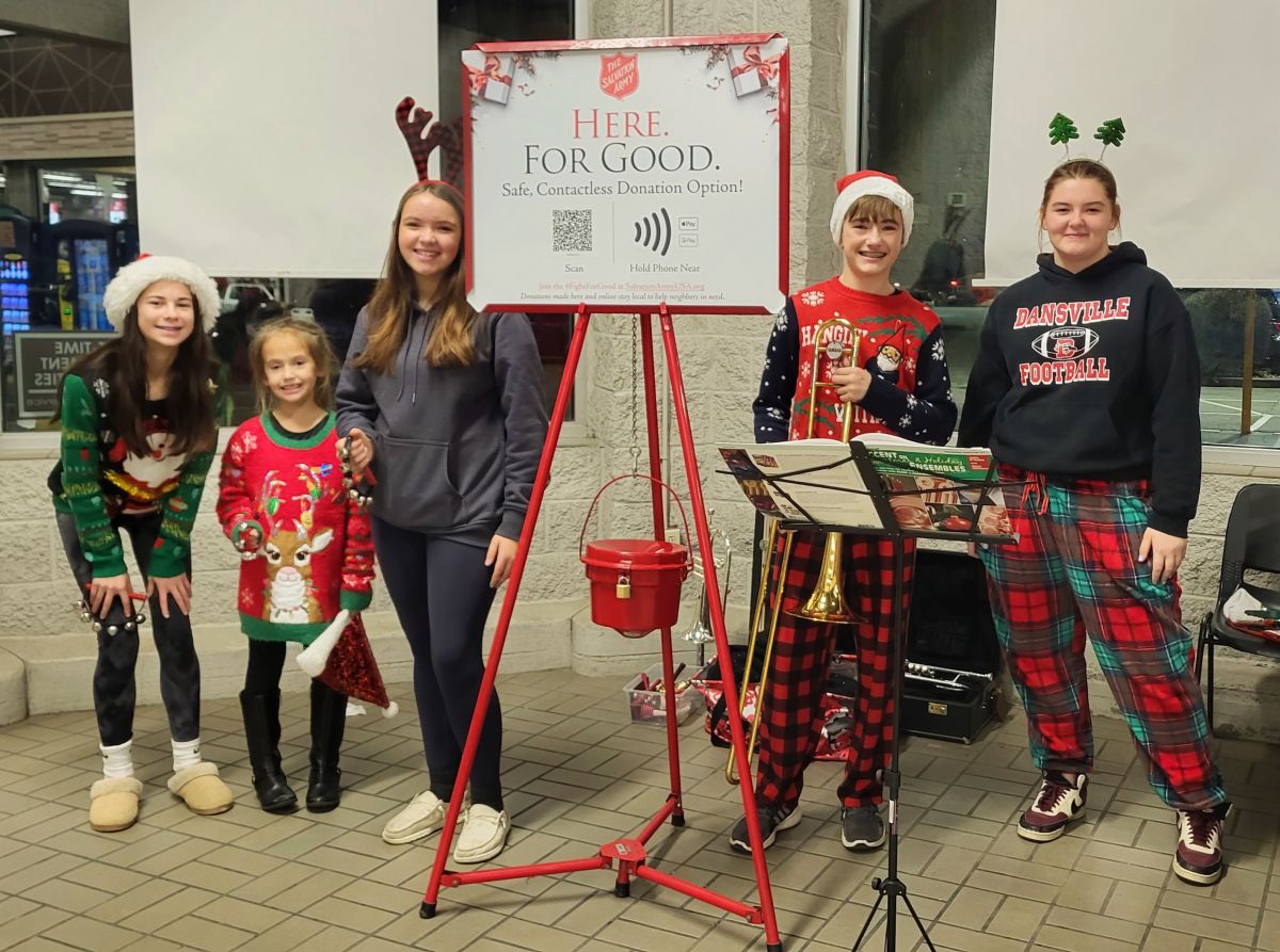 7th and 8th grade band members "Ringing the Bell" | Post Page