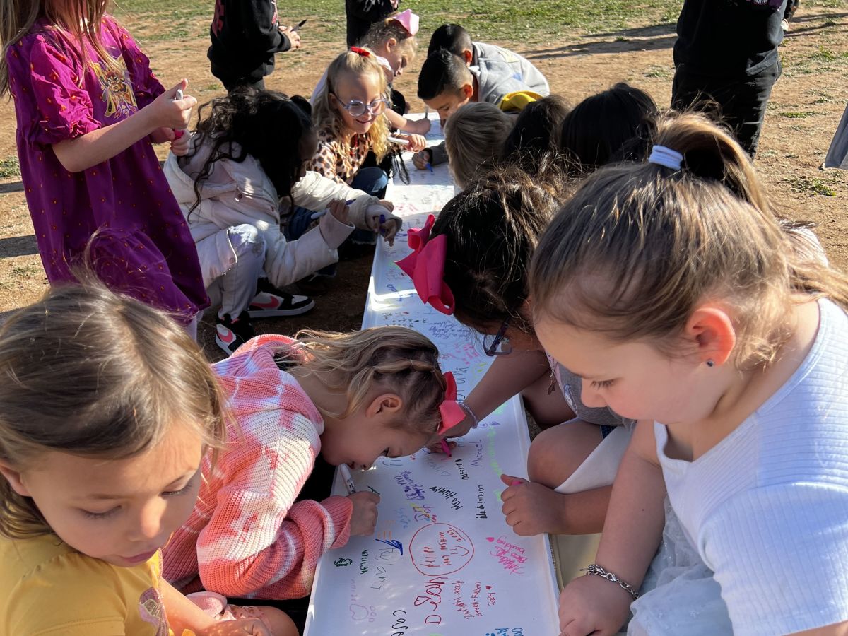 Students and Staff from McGill and Austin Elementaries Sign Last Beam ...