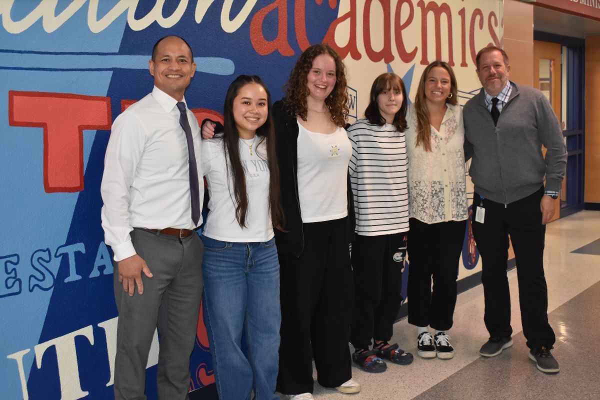 Artist Phoebe Cornog returns to her alma mater to paint hallway mural ...