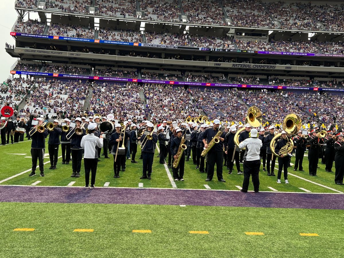 Liberty Marching Band Joins UW Husky Band for Epic Game Day Show | News ...