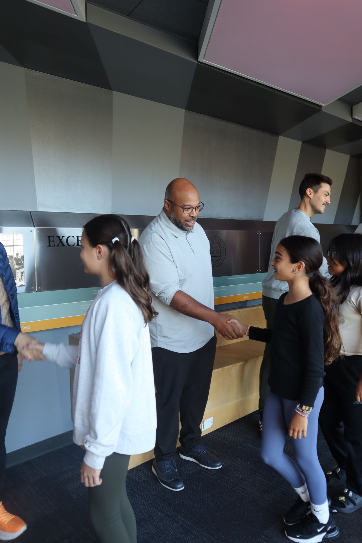 Middle School students practice proper handshakes | LU Article - Latin ...