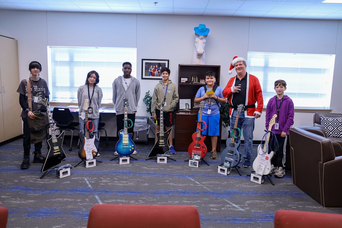 Medlin teacher gives away guitars with Santa's help | Details ...