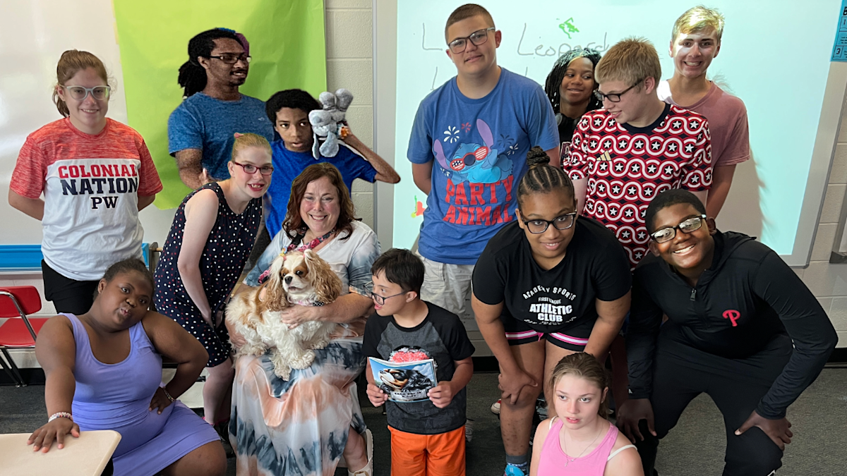 Teacher visits ESY students with a special story and a furry friend | PE Posts Item