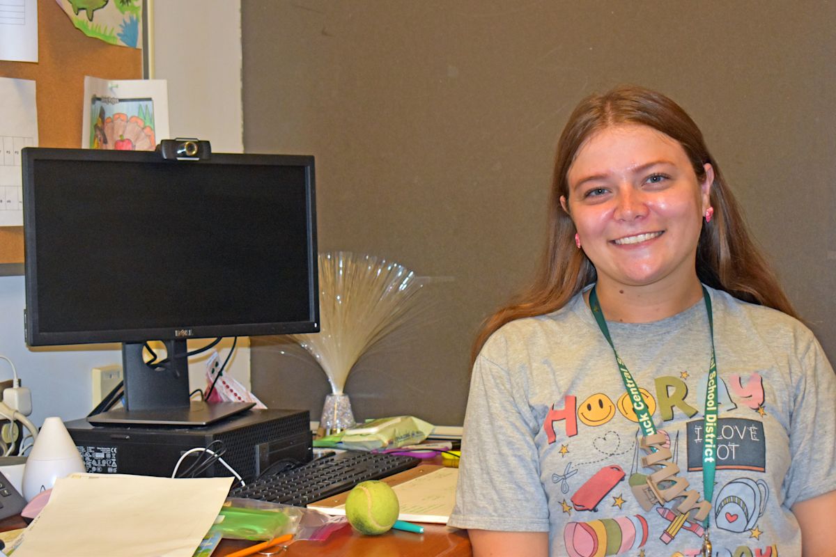 Lindquist assisting students in completing daily tasks | Default Board ...