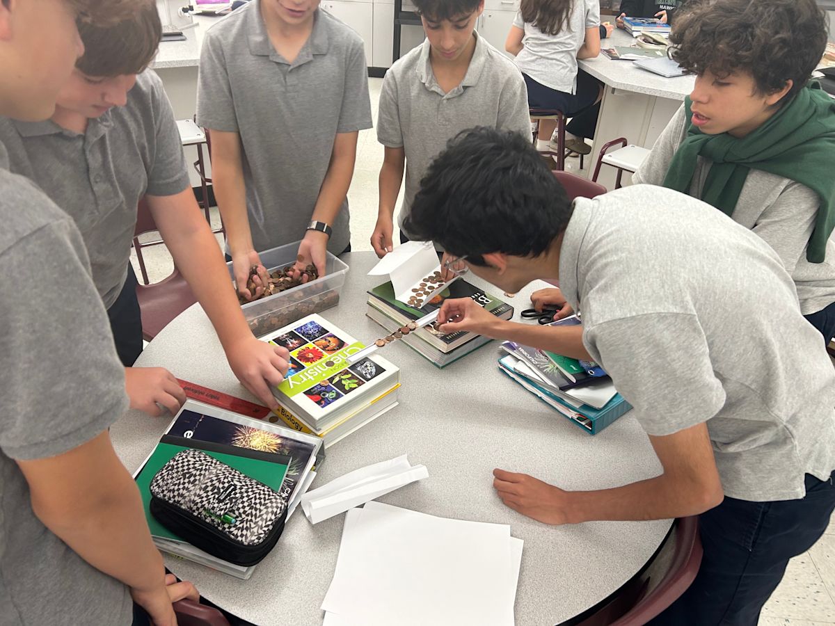 Eighth Grade Students Build a Paper Bridge Physics Lab | News Details