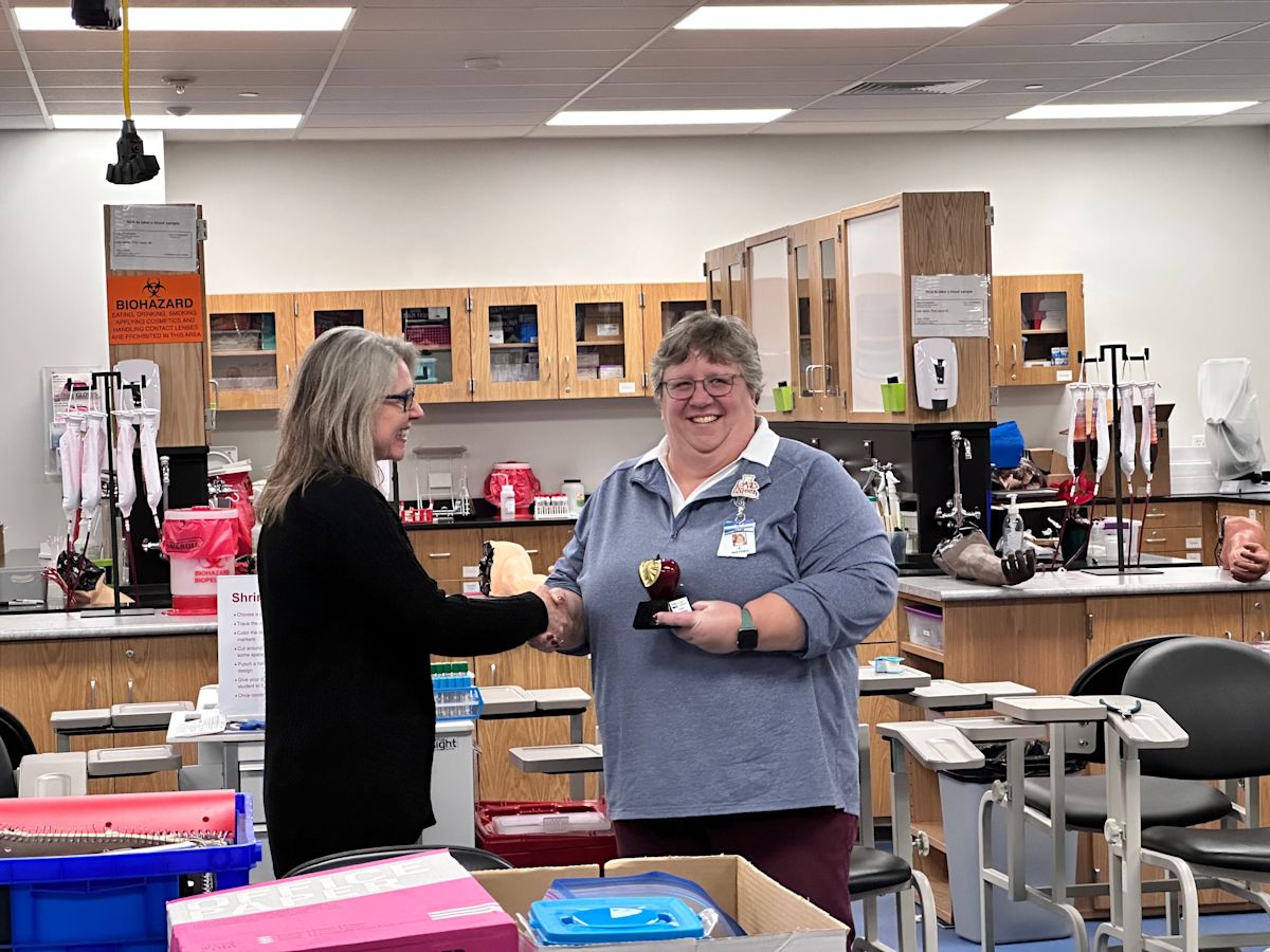 Mrs. Wathen, Awarded Golden Apple Award | High School News Article