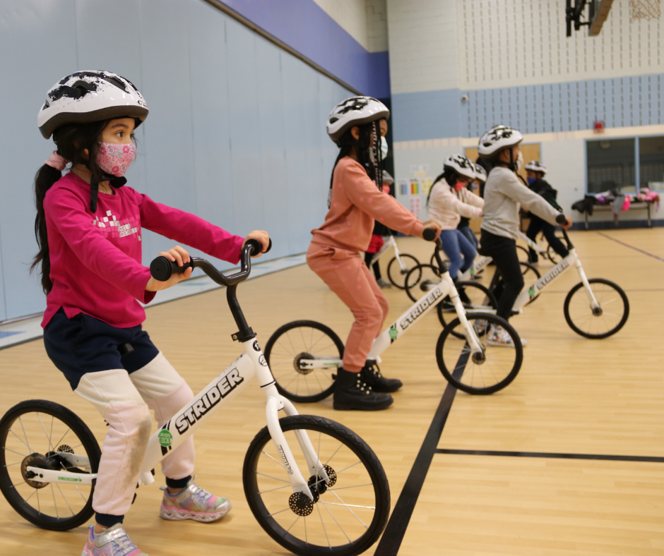 Pedal pushers — Kindergarten students participate in All Kids Bike ...