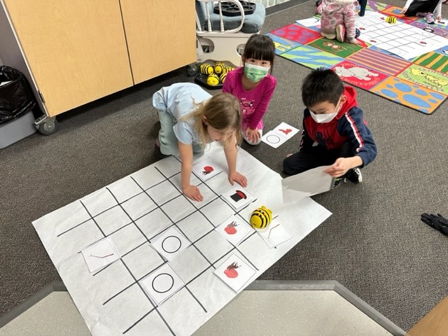 First Graders Practice Coding in Winter Fashion | News Article ...