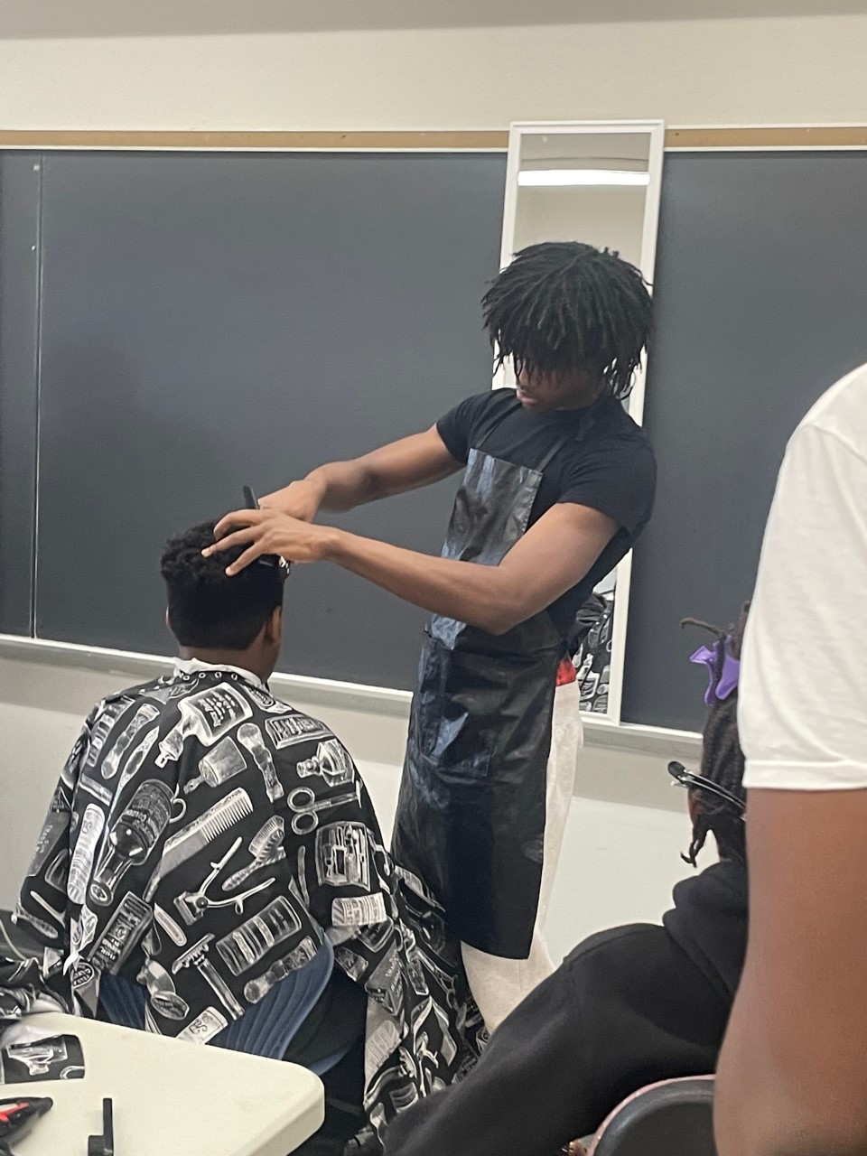 Students from barbering and cosmetology classes visit Edward Williams ...