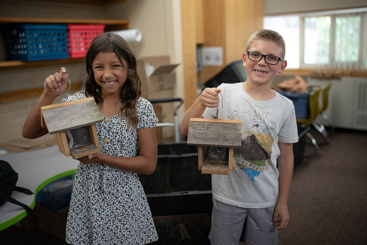 Elementary students experience woodworking with bird feeder project ...