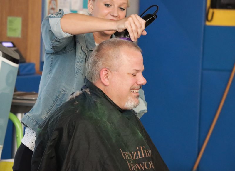 Mr. Hess shaves his head after Mary Helen Guest Elementary students met ...