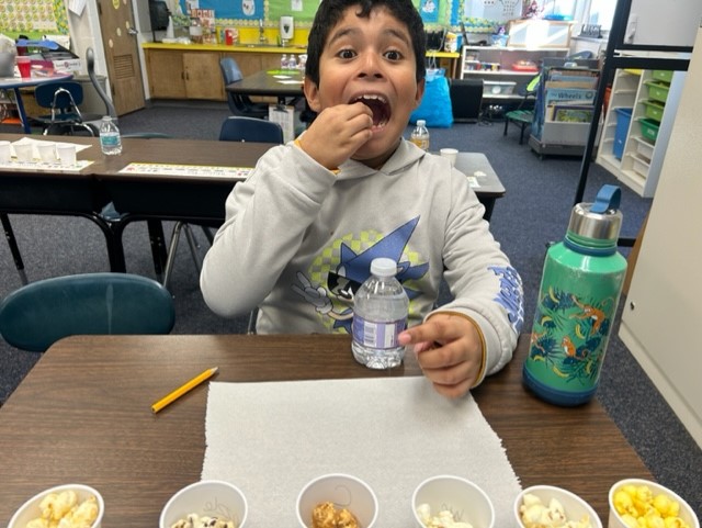 Students vote for the favorite flavors on National Popcorn Day ...