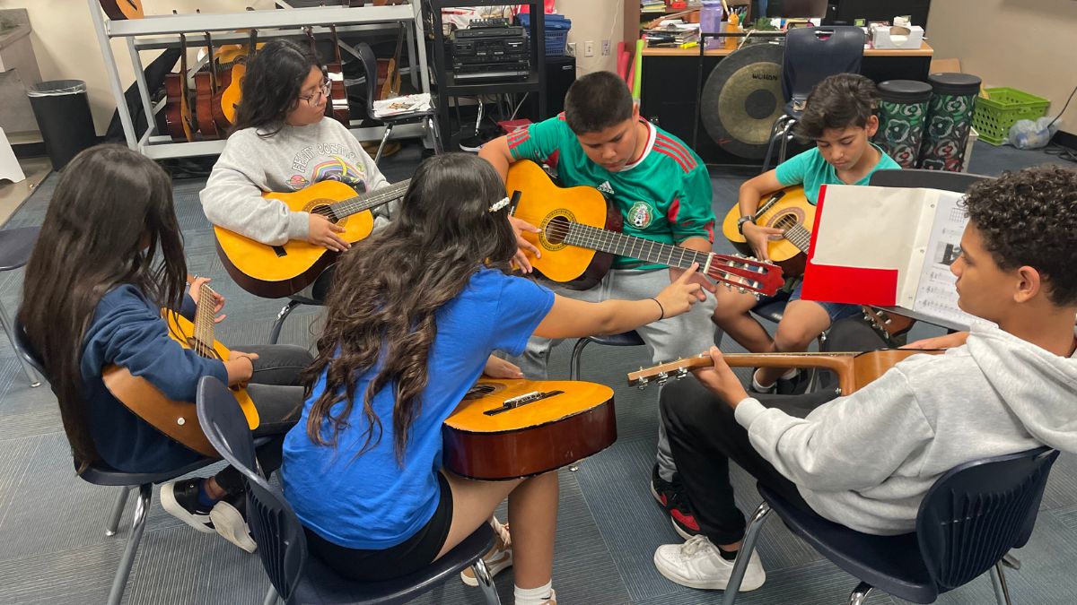 Acoustic guitar lessons happening in 6th grade Music! | News Details