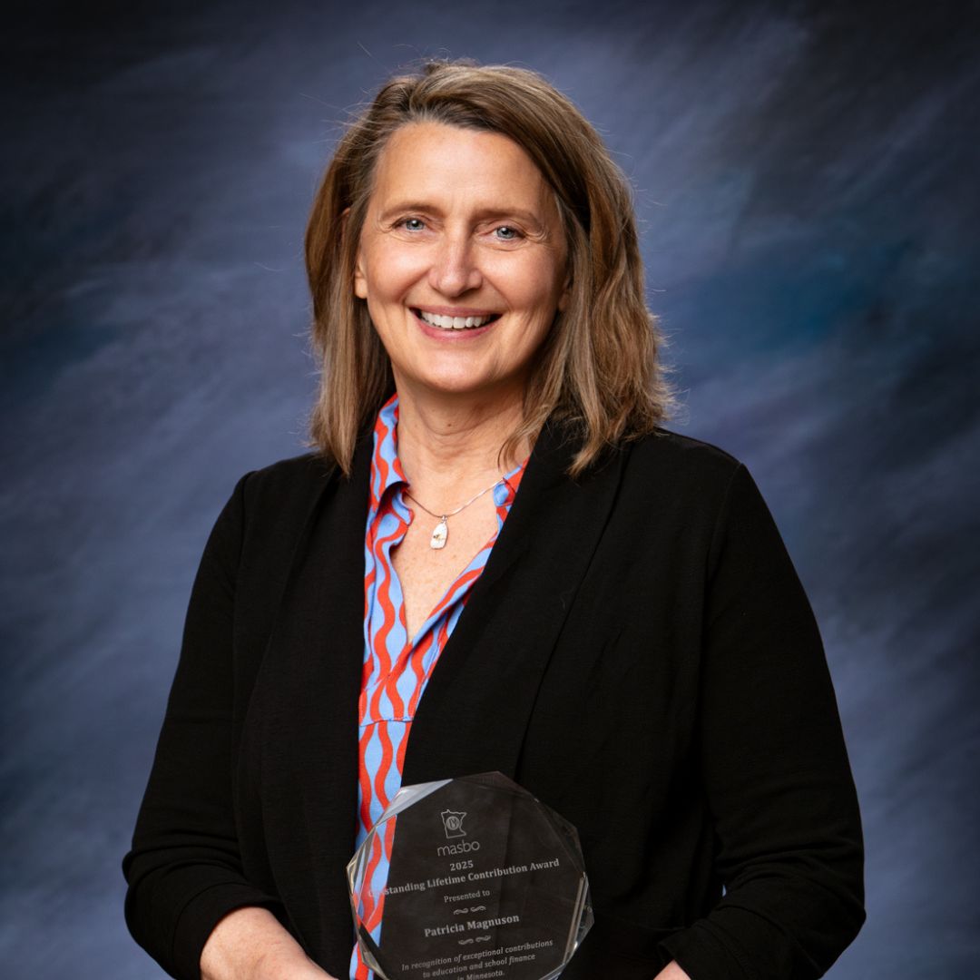 Patricia Magnuson, SLP Director of Business Services, receives the 2025 ...